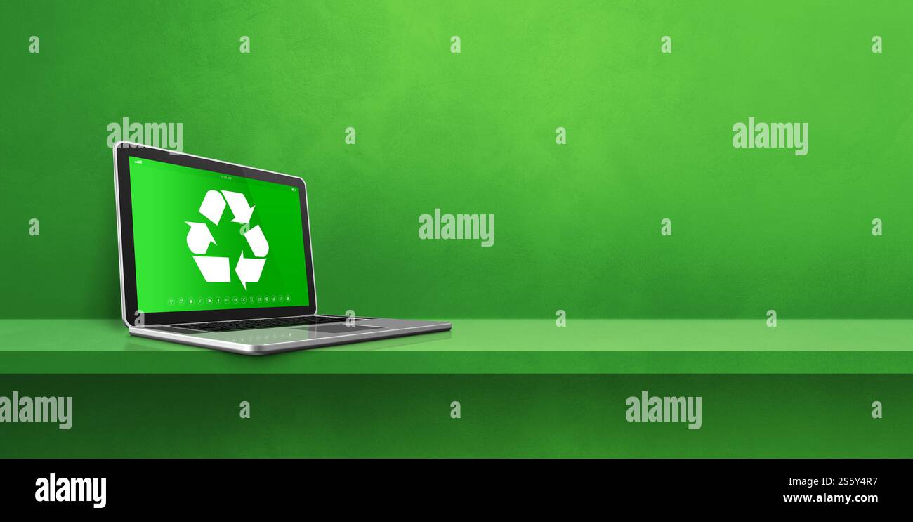 Laptop computer on a shelf with a recycling symbol on screen ...