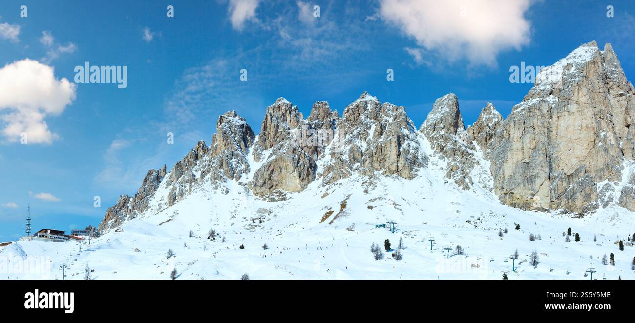 Morning winter rocky mountain panorama with ski station. Gardena Pass ...