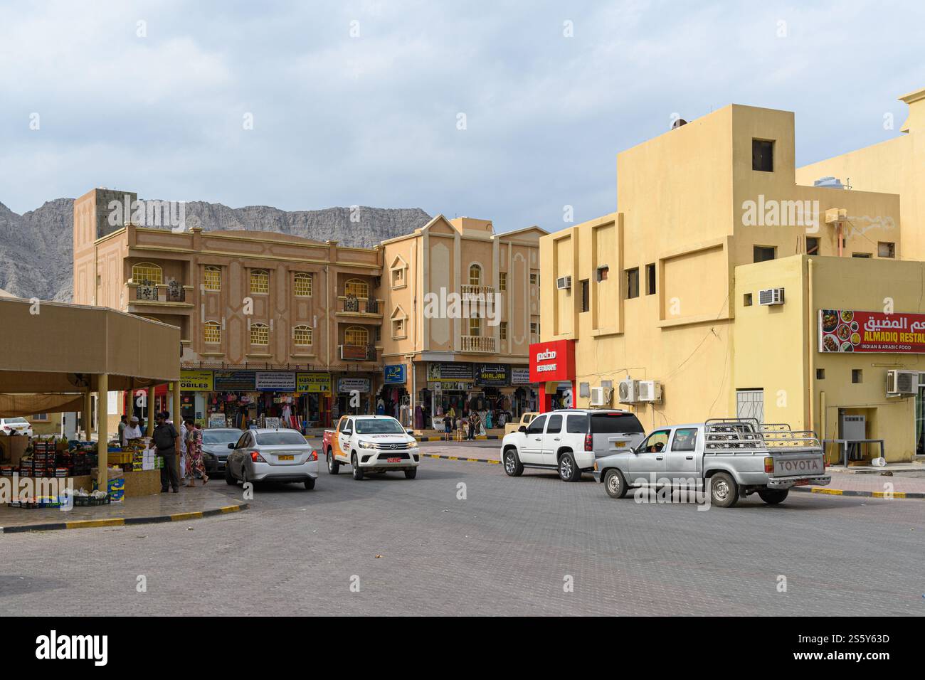 Khasab, Oman - January 1, 2025: A bustling street scene with local ...