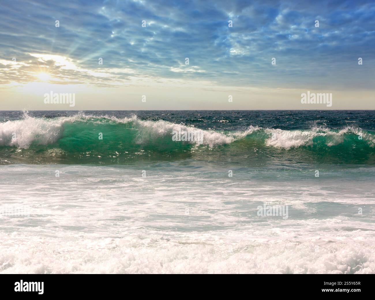 Ocean waves overcast sky dusk hi-res stock photography and images - Alamy