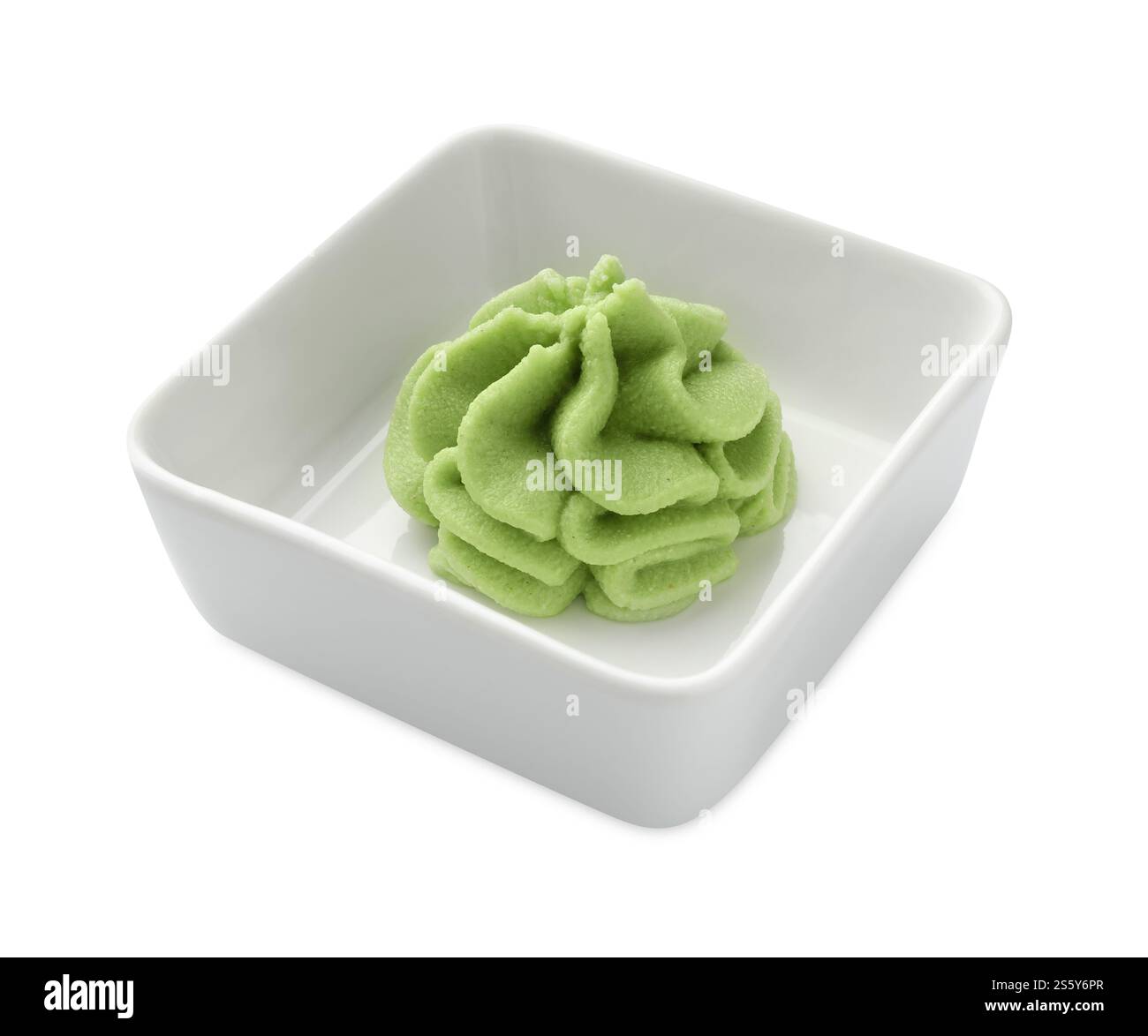 Hot wasabi paste in bowl isolated on white Stock Photo - Alamy