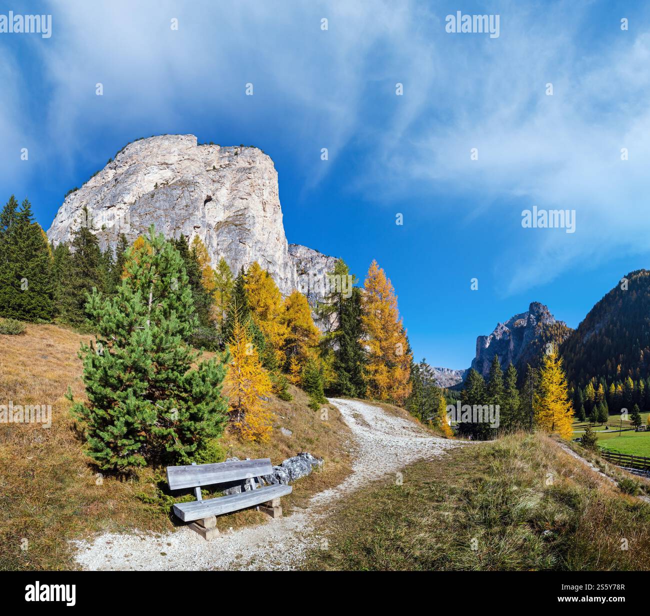 Autumn alpine Dolomites mountain scene and unrecognizable paragliders ...
