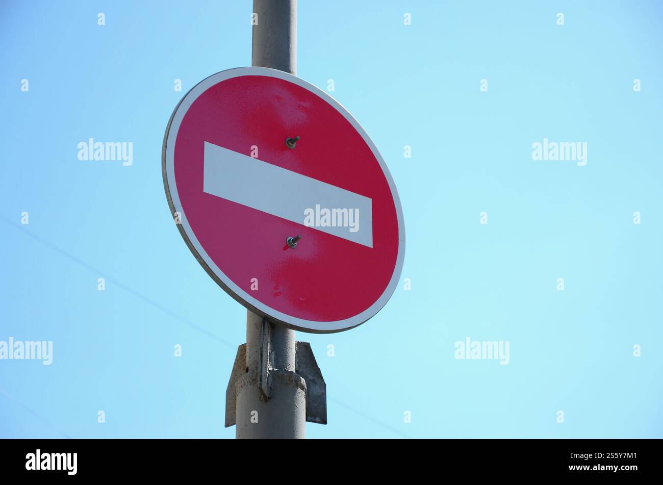 Road sign in the form of a white rectangle in a red circle. No entry ...