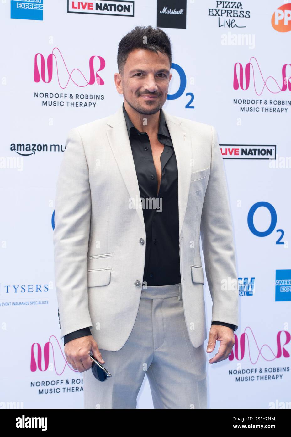 Peter Andre attends the Nordoff and Robbins O2 Silver Clef Awards at ...