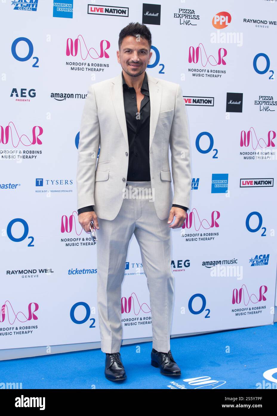 Peter Andre attends the Nordoff and Robbins O2 Silver Clef Awards at ...
