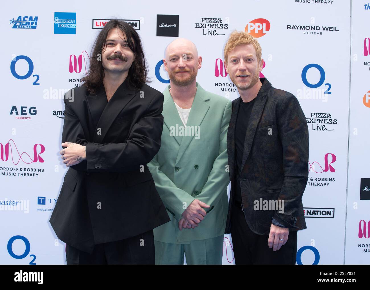 Simon Neil, Ben Johnston and James Johnston of Biffy Clyro attends the ...