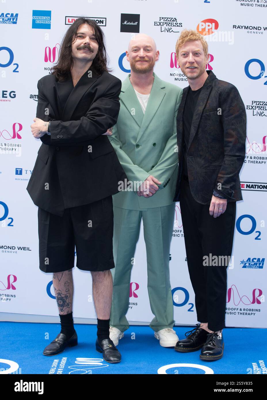 Simon Neil, Ben Johnston and James Johnston of Biffy Clyro attends the ...