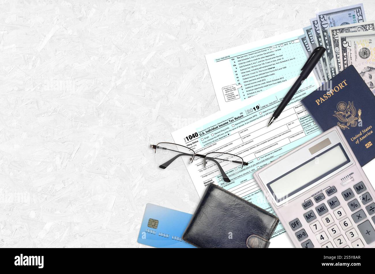 IRS form 1040 Individual income tax return lies on flat lay office ...