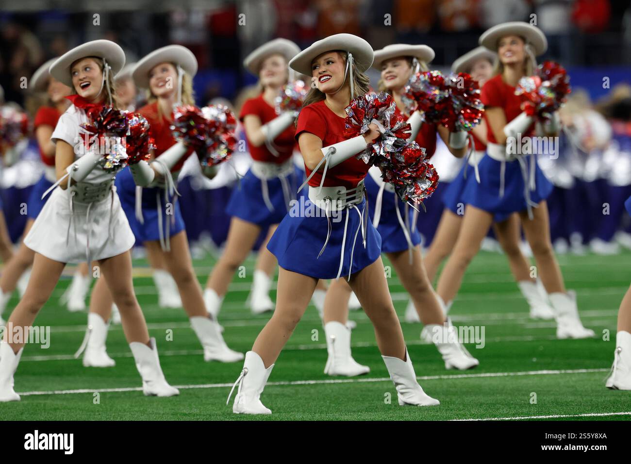 The Kilgore College Rangerettes perform during pregame ceremonies at ...