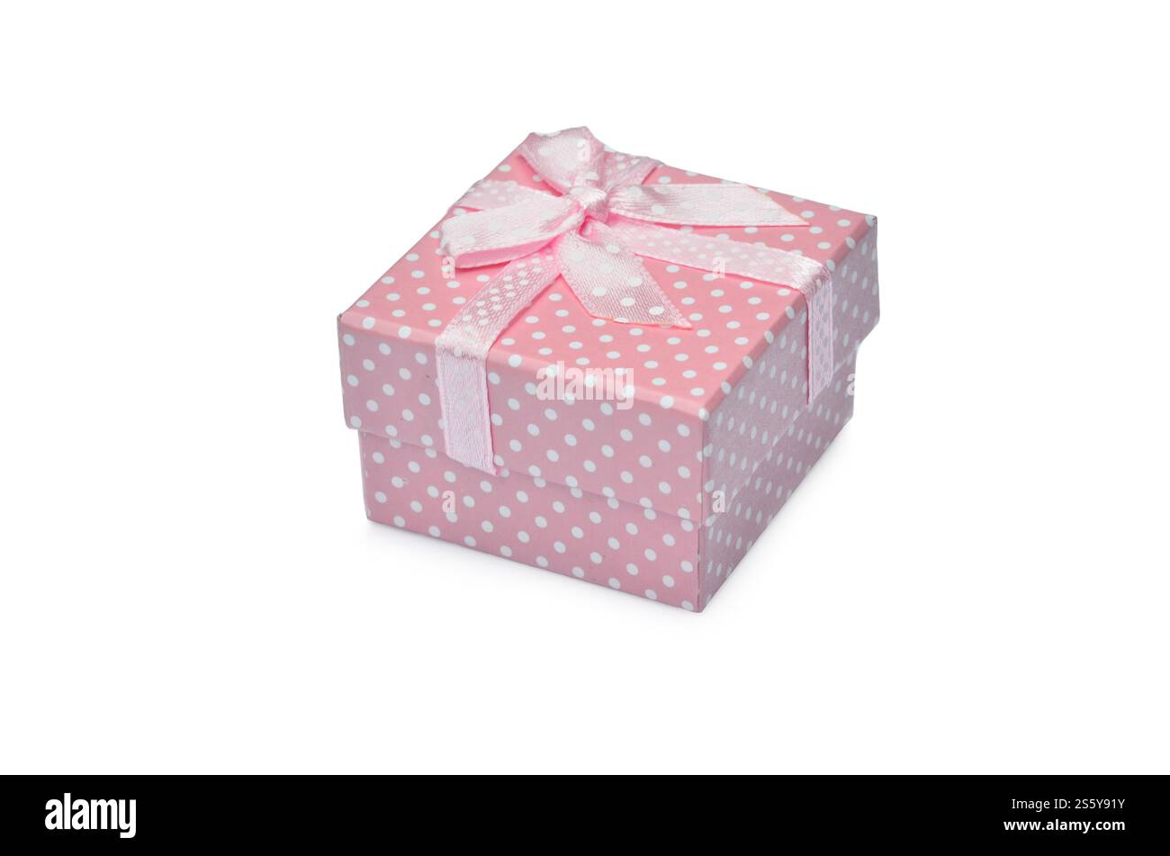 Pink dotted mini present-box with ribbon isolated on white background ...