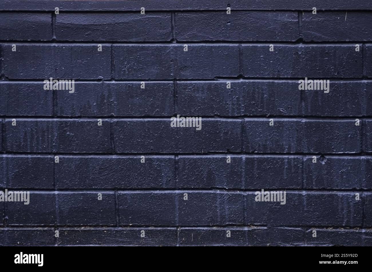 Weathered stained old block wall background. Texture of an old wall of ...