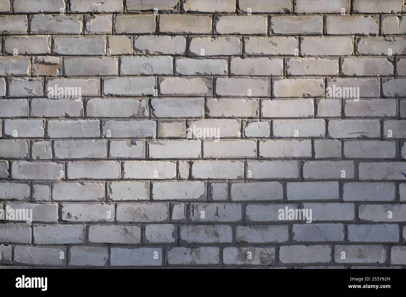 Weathered stained old white brick wall background. Texture of an old ...