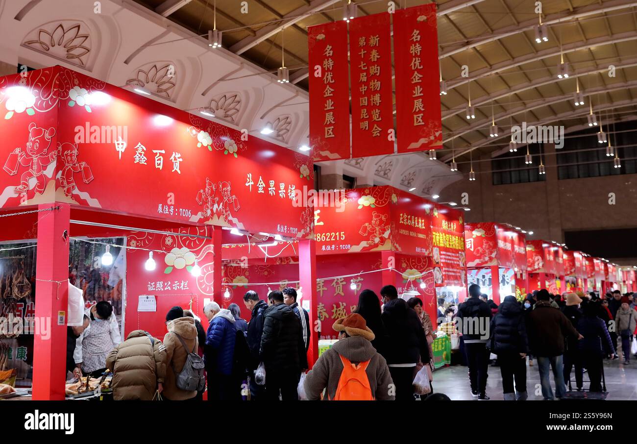 People visit a Spring Festival goods fair in Kunming City, southwest ...
