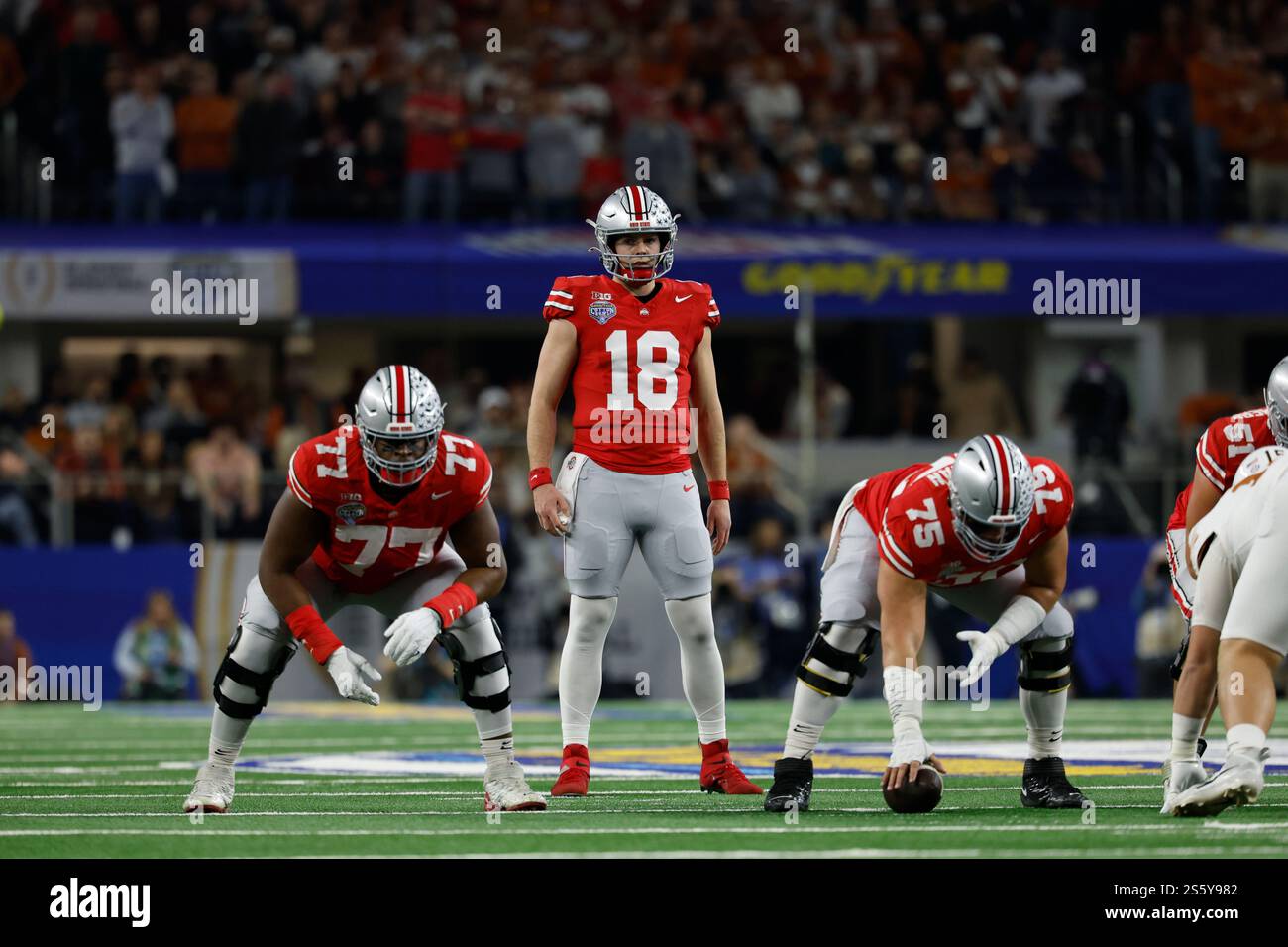Ohio State quarterback Will Howard (18) awaits the snap from center ...