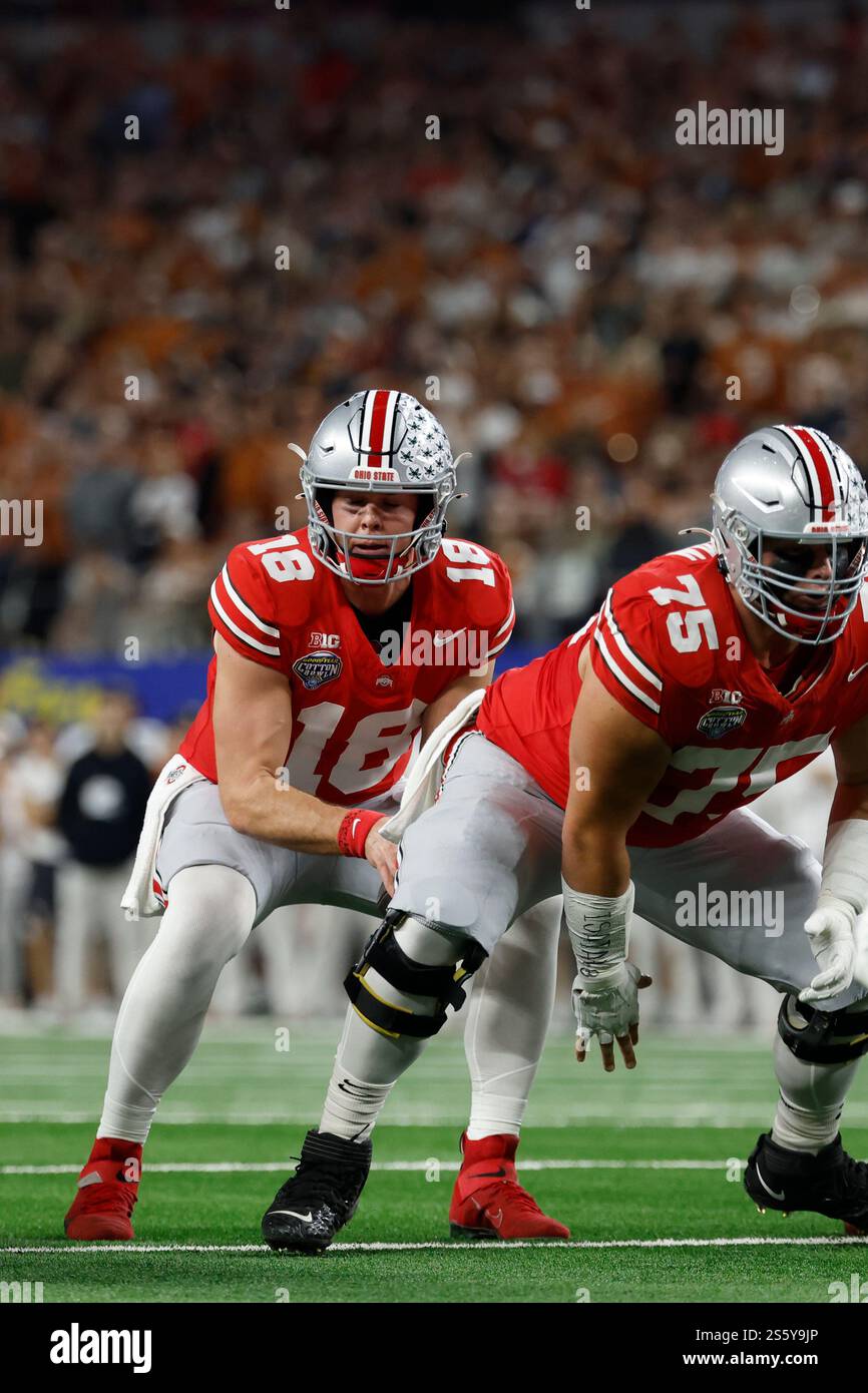 Ohio State quarterback Will Howard (18) takes the snap from center ...