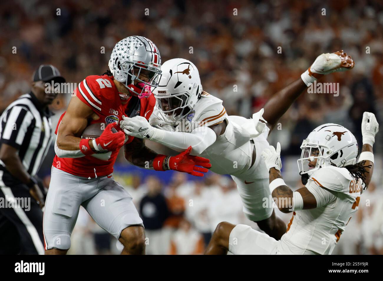 Ohio State wide receiver Emeka Egbuka (2) carries the ball after a ...