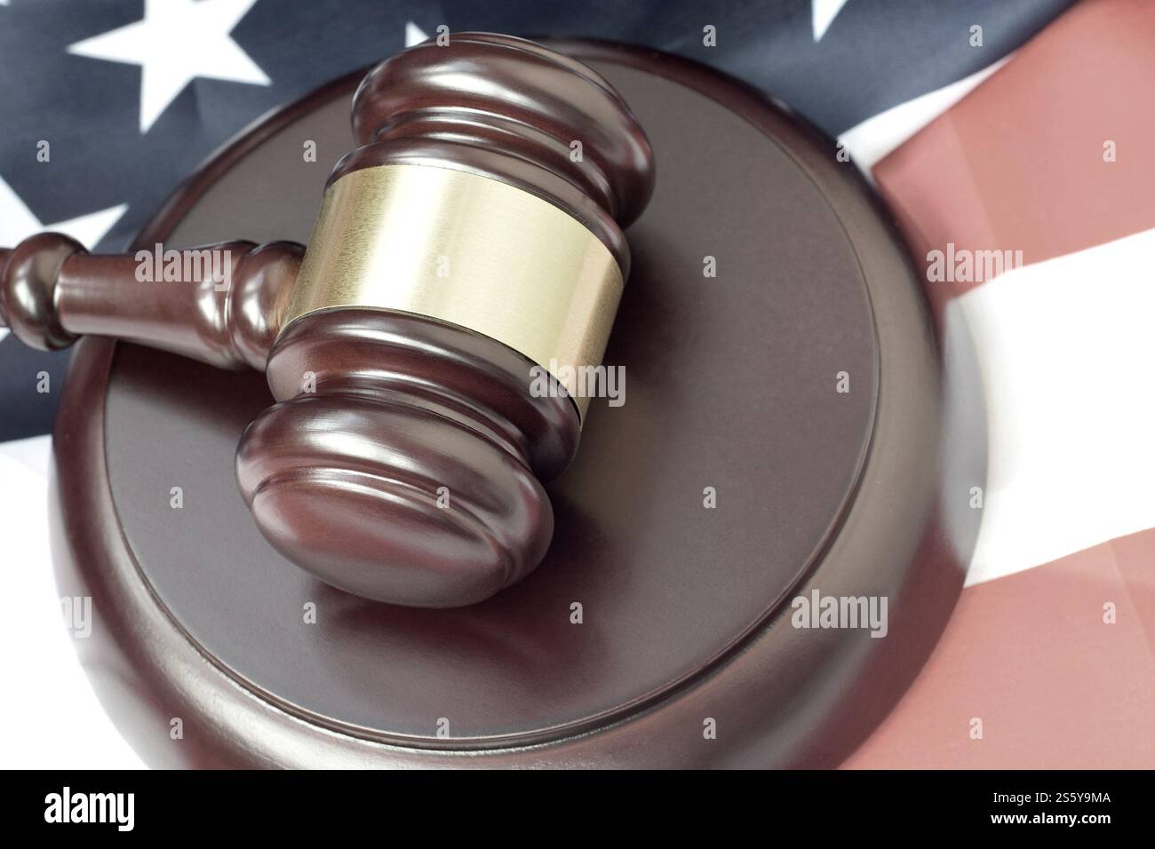 Justice mallet on United States flag in a courtroom during a judicial ...