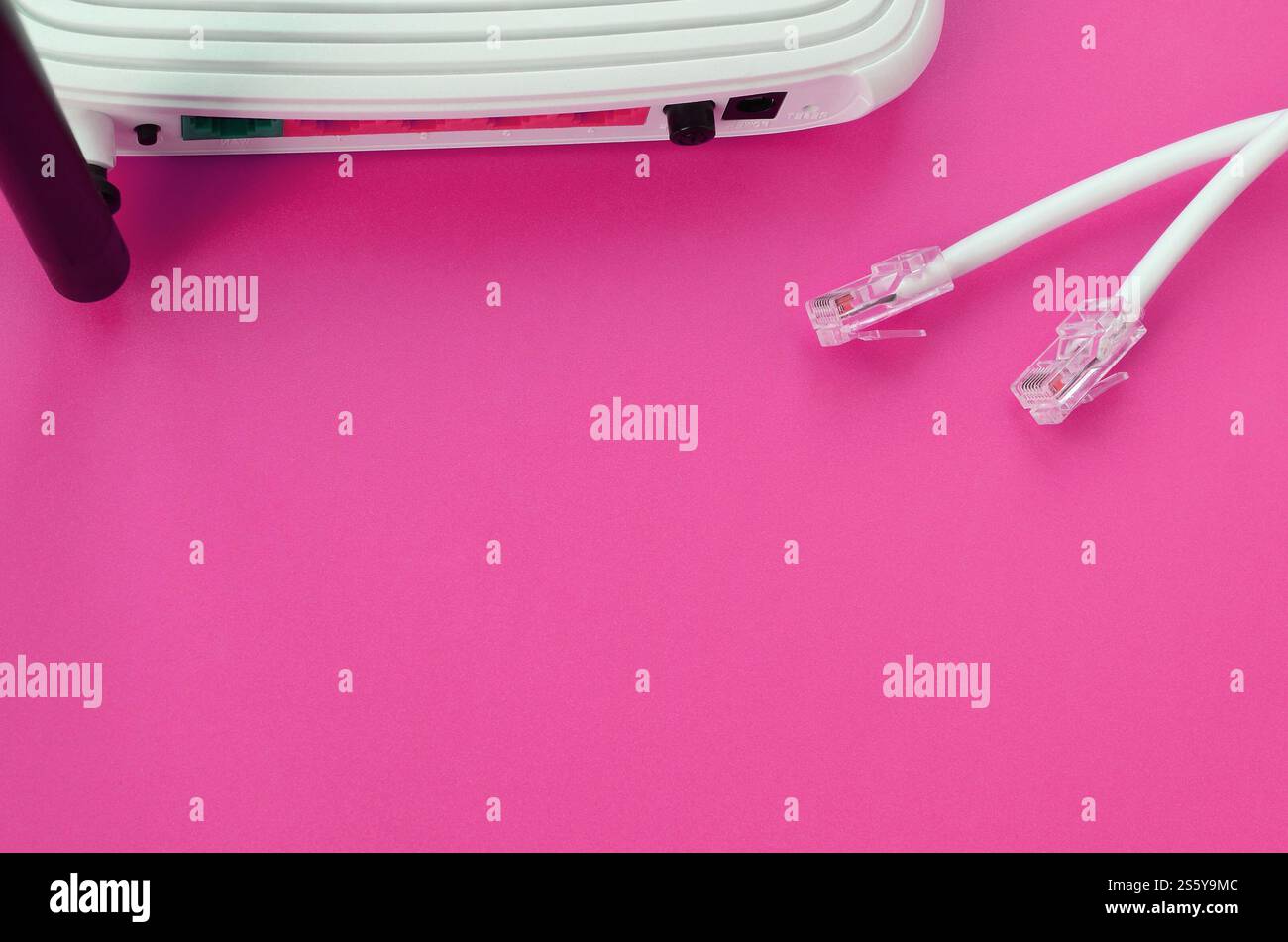 Internet Router And Internet Cable Plugs Lie On A Bright Pink Background Items Required For