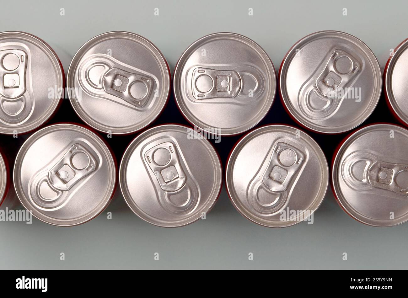 Many new aluminium cans of soda soft drink, lemonade cola, beer or ...