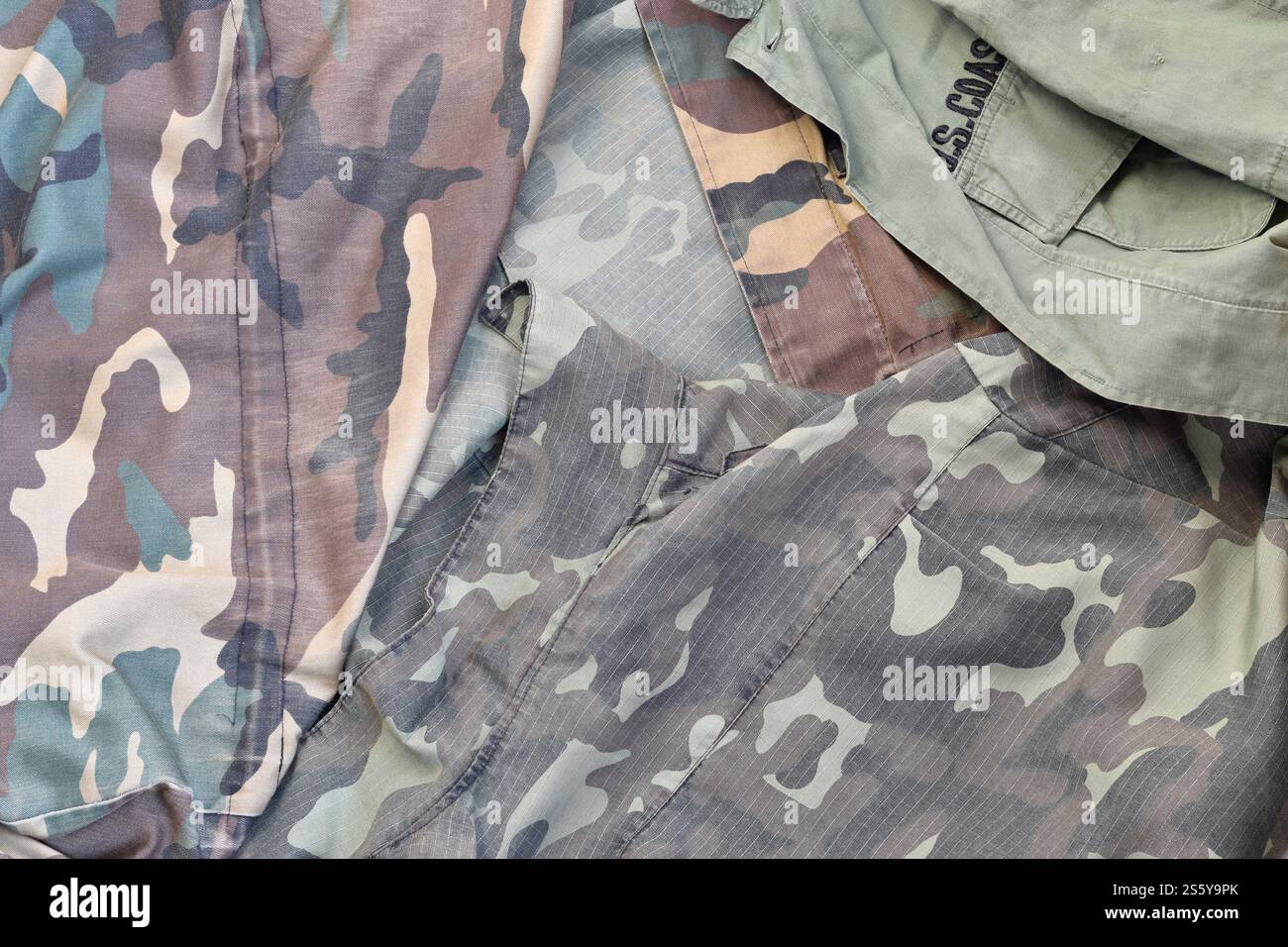 Camouflage background texture as backdrop for military service design ...
