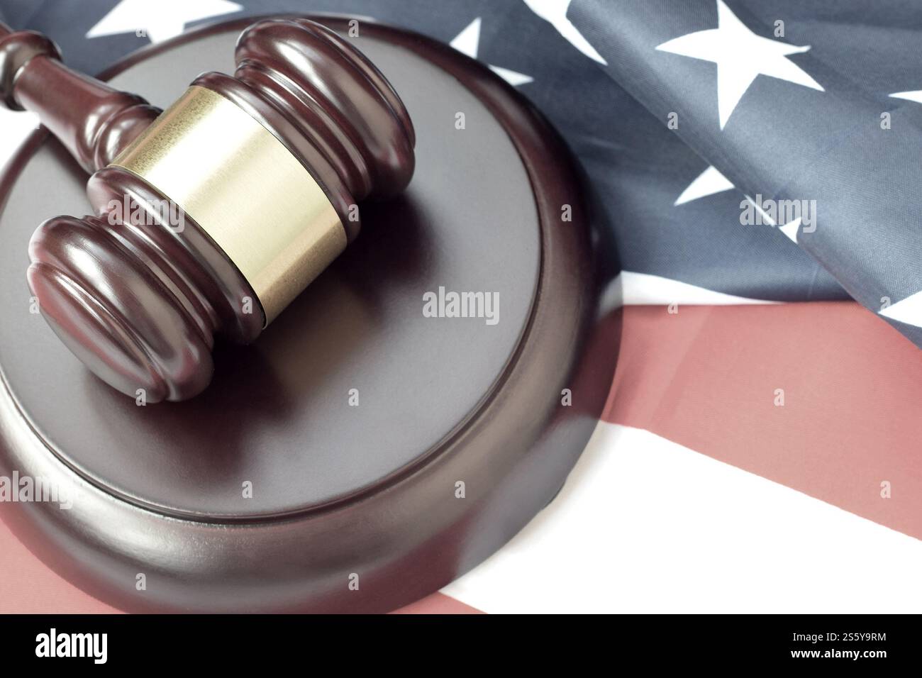 Justice mallet on United States flag in a courtroom during a judicial ...