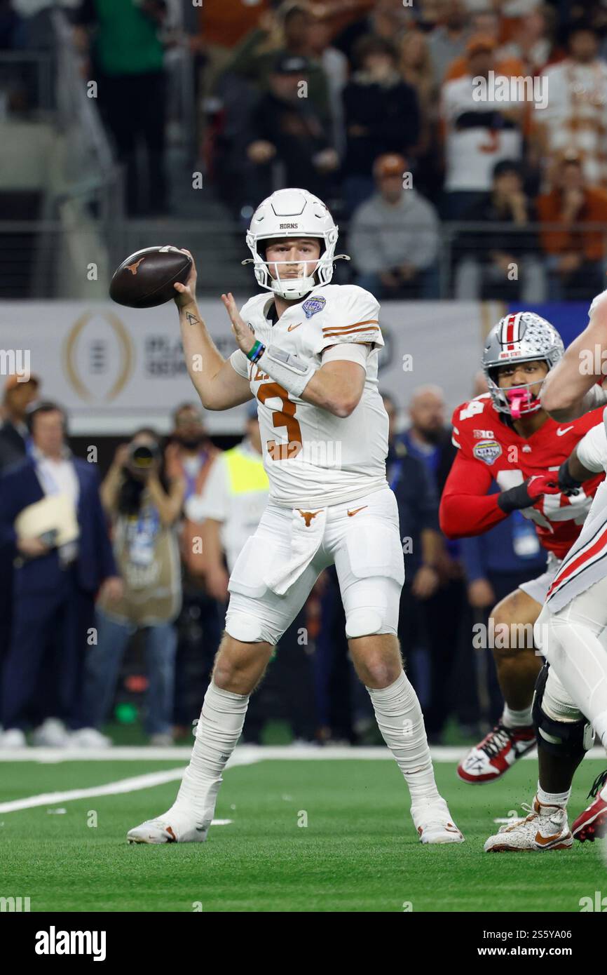 Texas quarterback Quinn Ewers (3) looks to pass during the Cotton Bowl ...