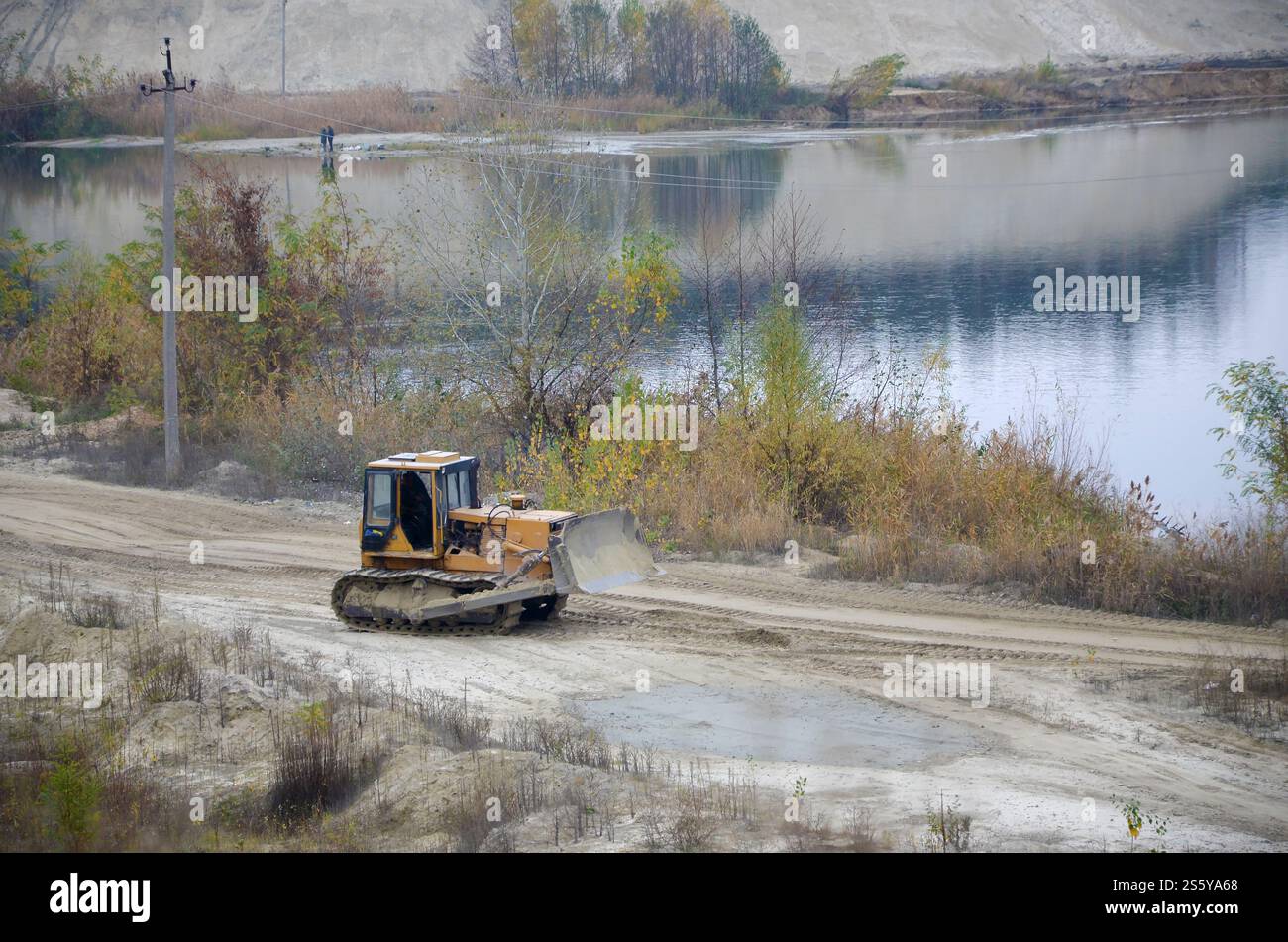 Quarry aggregate with heavy duty machinery on Construction industry ...