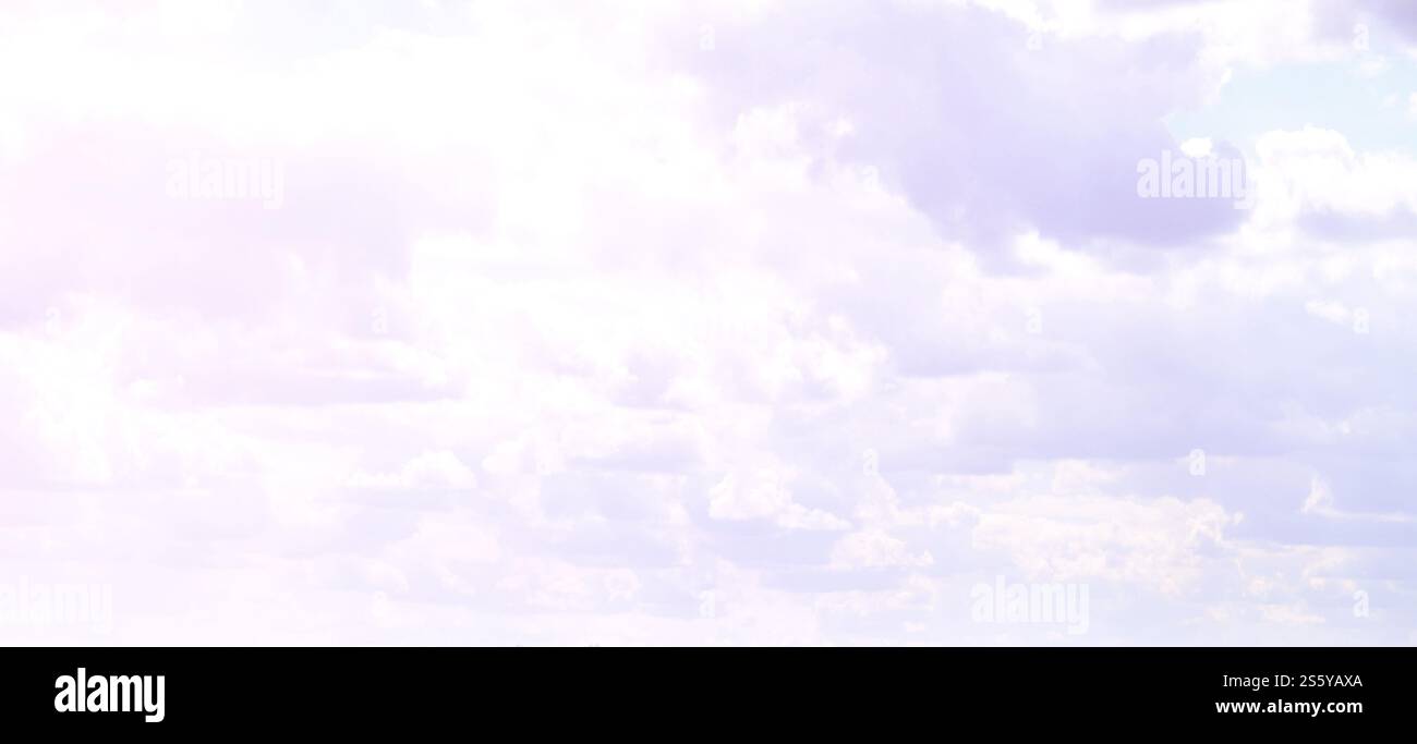 Heavenly space of blue color with a lot of thick white clouds ...