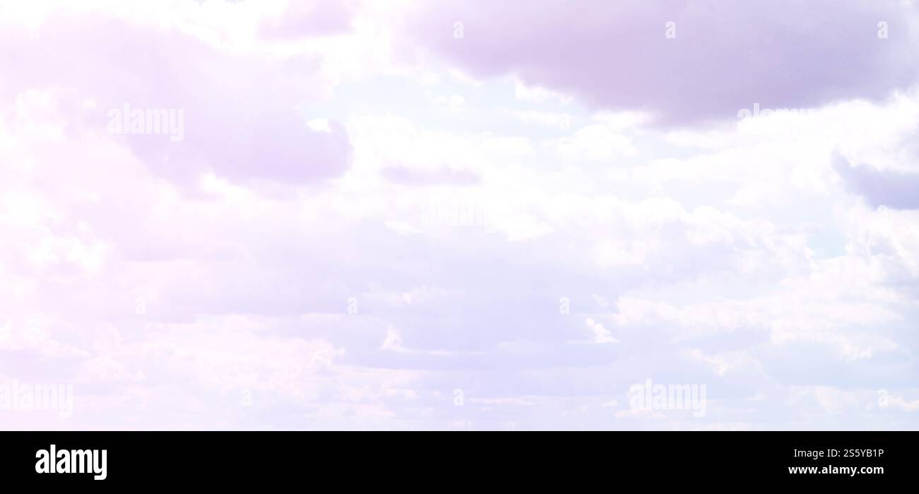 Heavenly space of blue color with a lot of thick white clouds ...