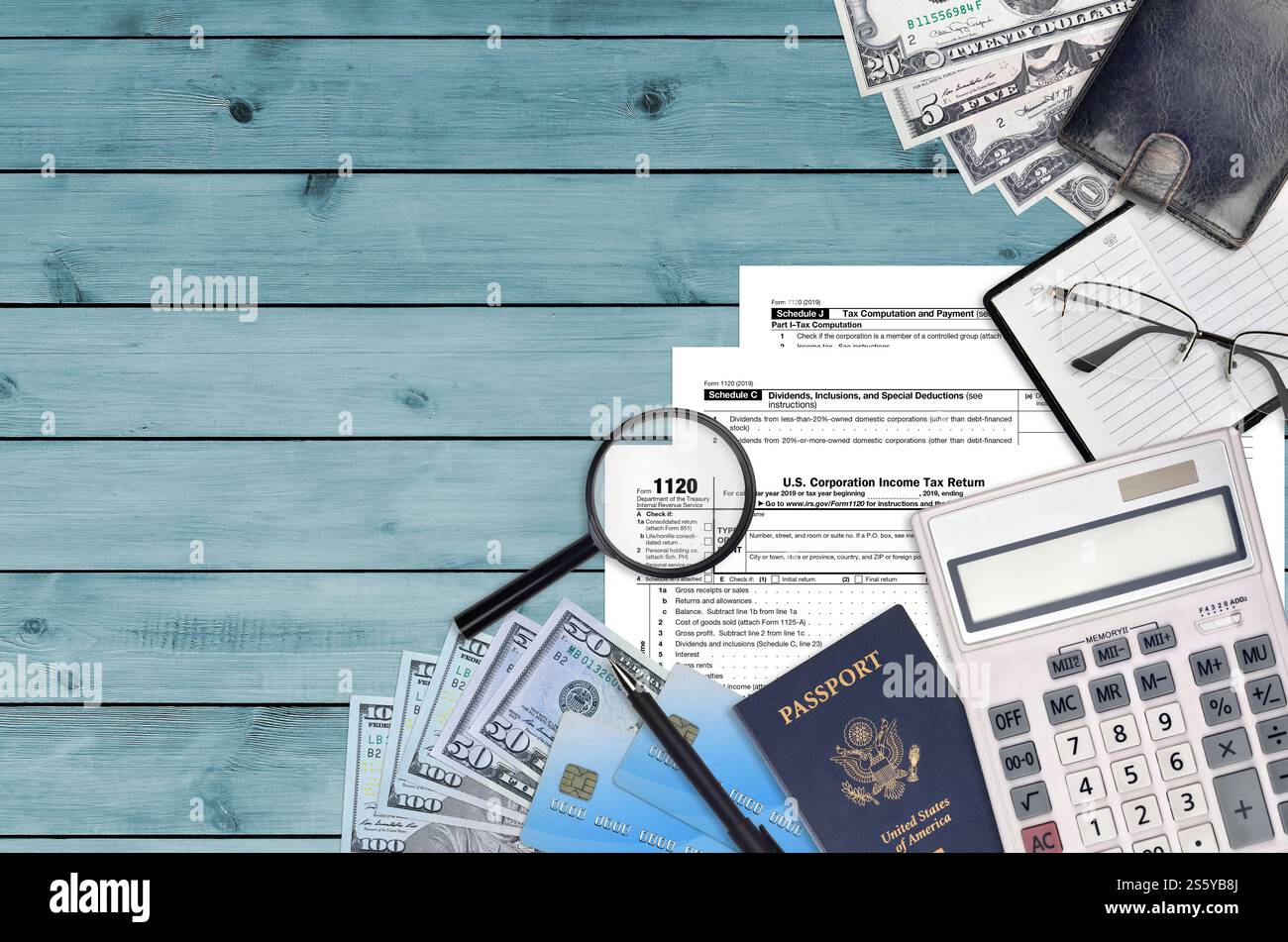 IRS form 1120 U.S. Corporation income tax return lies on flat lay ...