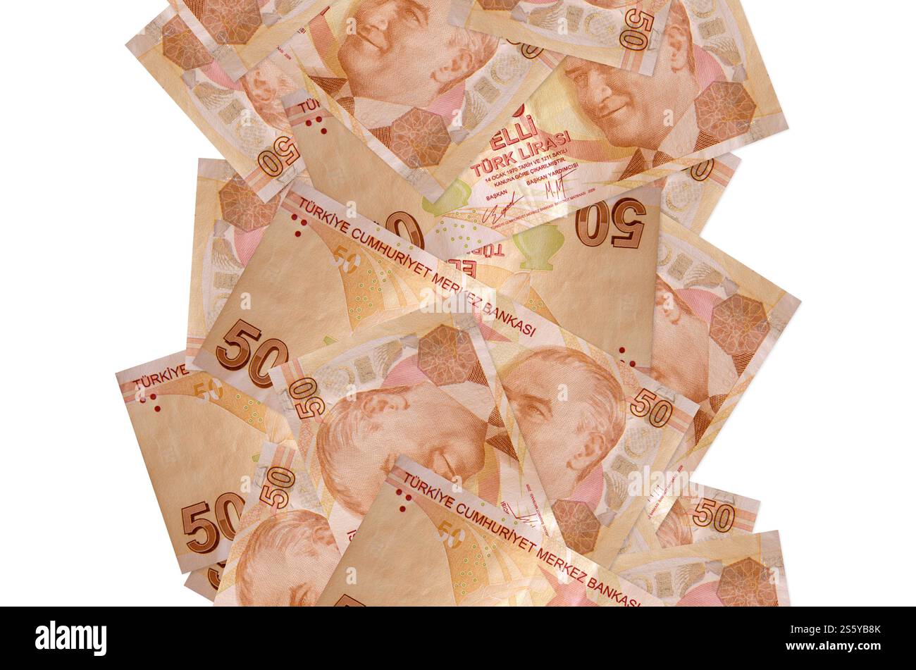 50 Turkish liras bills flying down isolated on white. Many banknotes ...