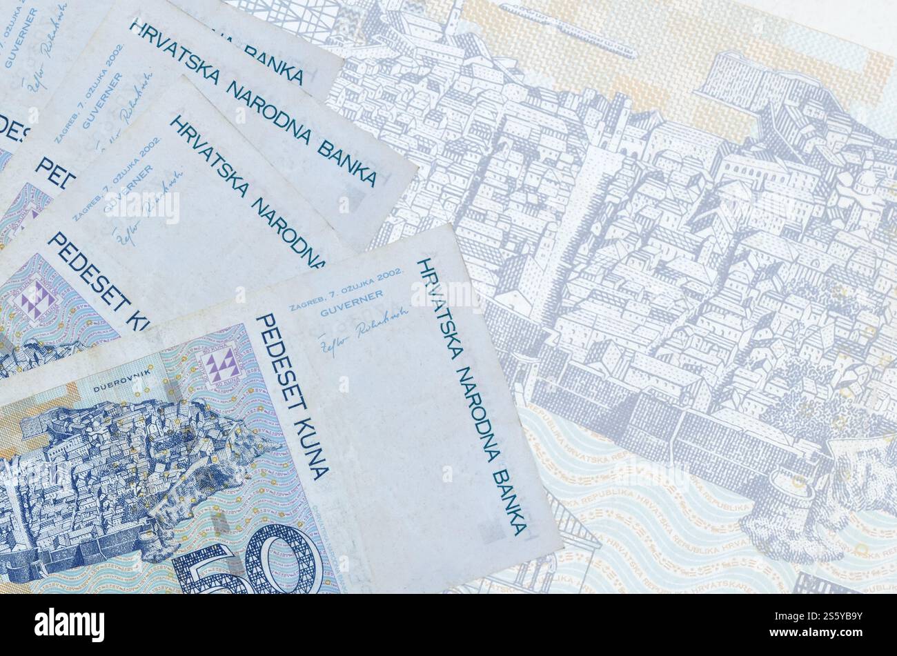 50 Croatian kuna bills lies in stack on background of big semi ...