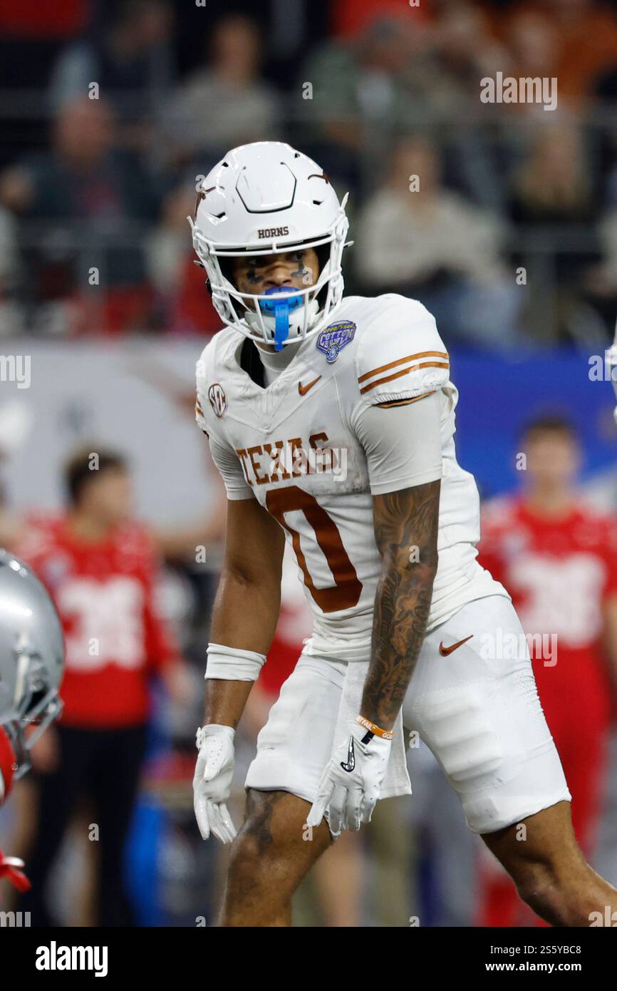 University of Texas wide receiver DeAndre Moore Jr. (0) lines up for ...