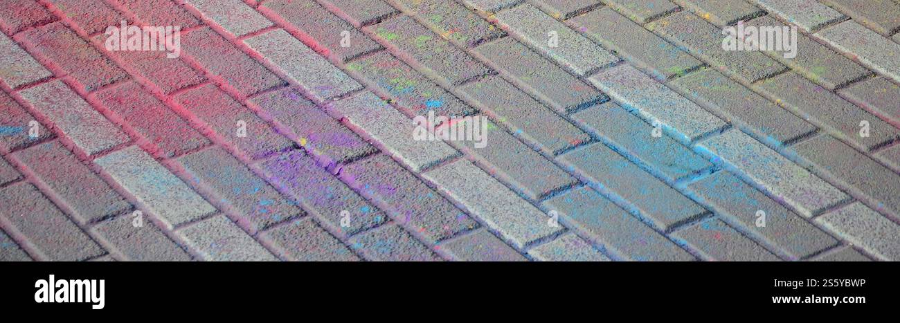Multi colored earth, paving slabs, powder coated with dry colors at the ...