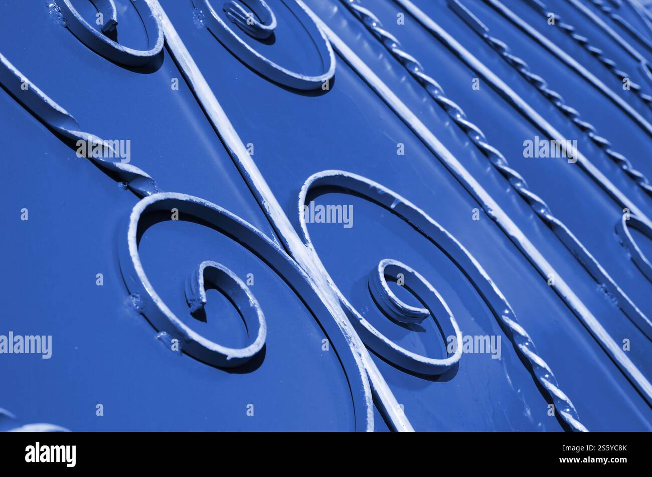 Metal texture of a piece of phantom classic blue wall with a forged ...