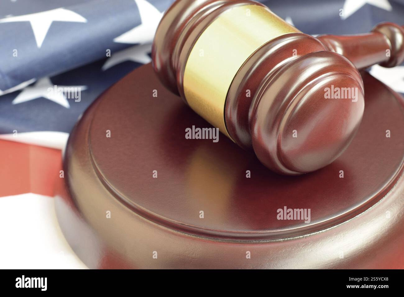 Justice mallet on United States flag in a courtroom during a judicial ...