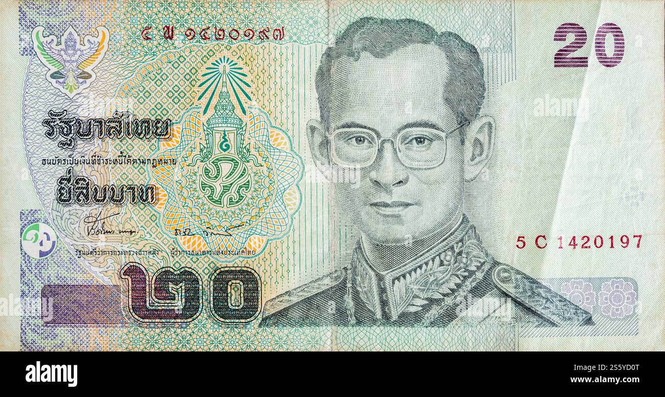 King Bhumibol Adulyadej on 20 Baht Thailand money bill close up. Bill ...