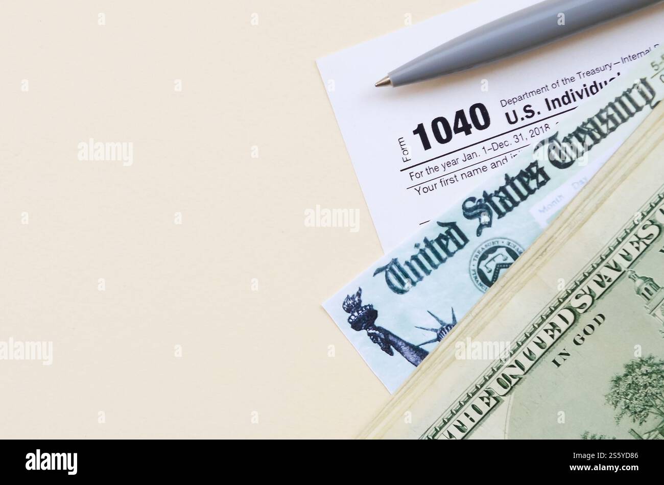 1040 Individual Income tax return form with Refund Check and hundred ...