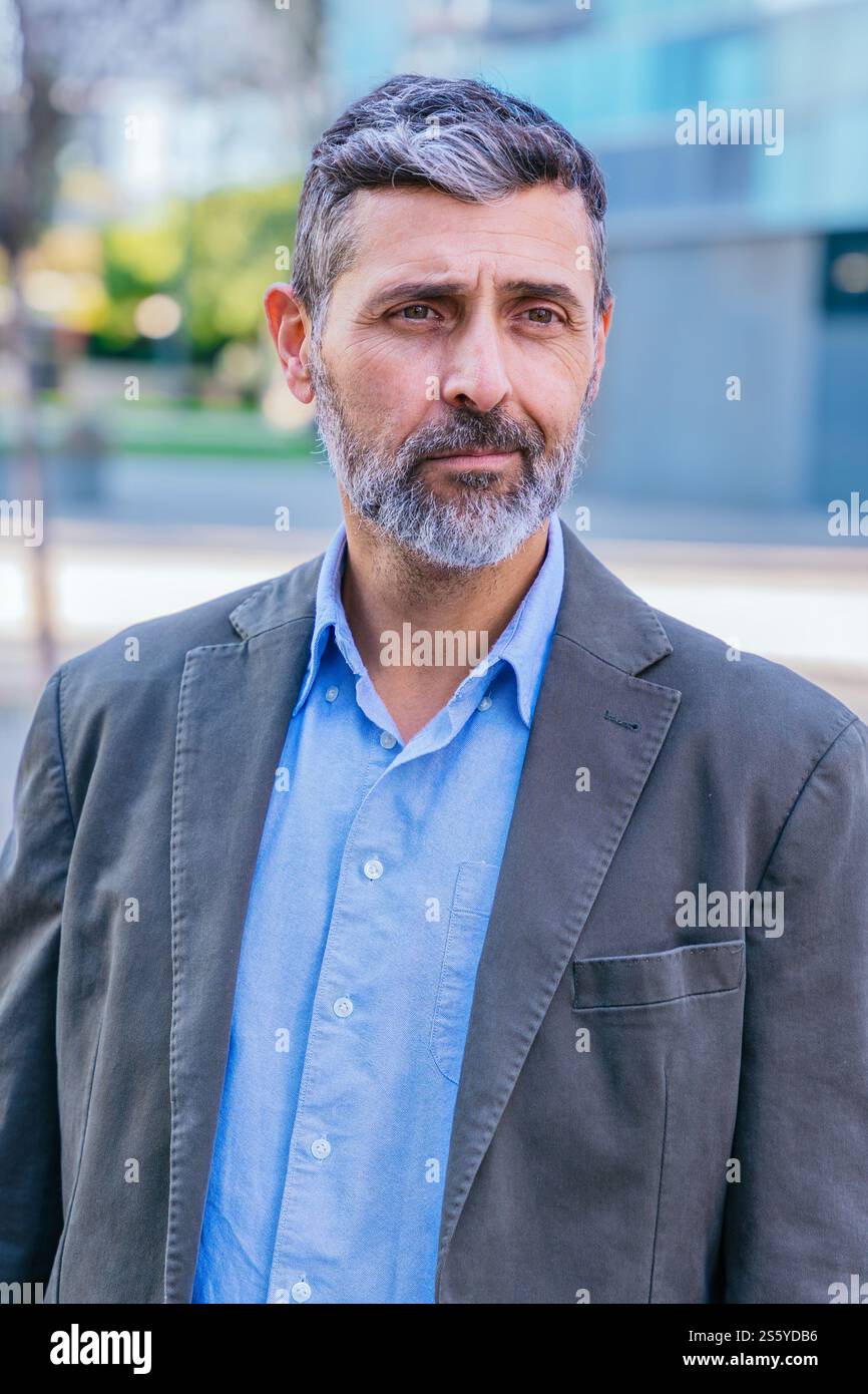 Vertical portrait Smiling Mature man Outdoors with Confident Expression ...