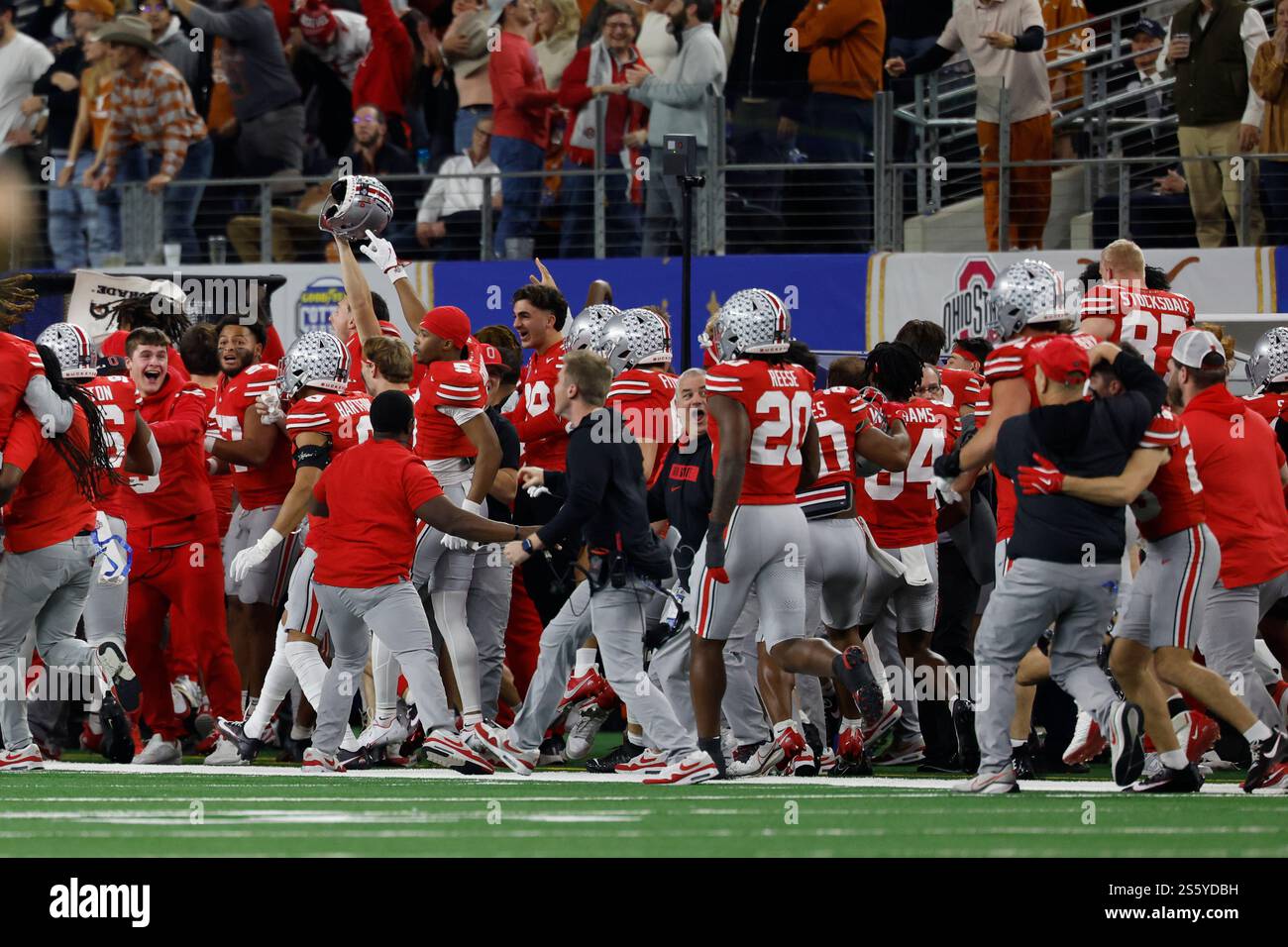 Ohio State players and coaches celebrate on the sideline of a returned ...