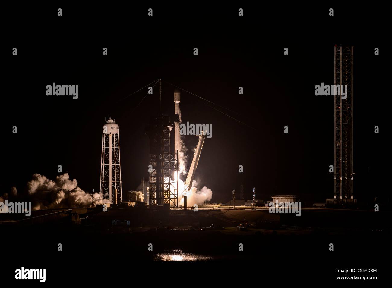 January 15, 2025, Merritt Island, Florida, USA: A SpaceX Falcon 9 rocket launches with two ...