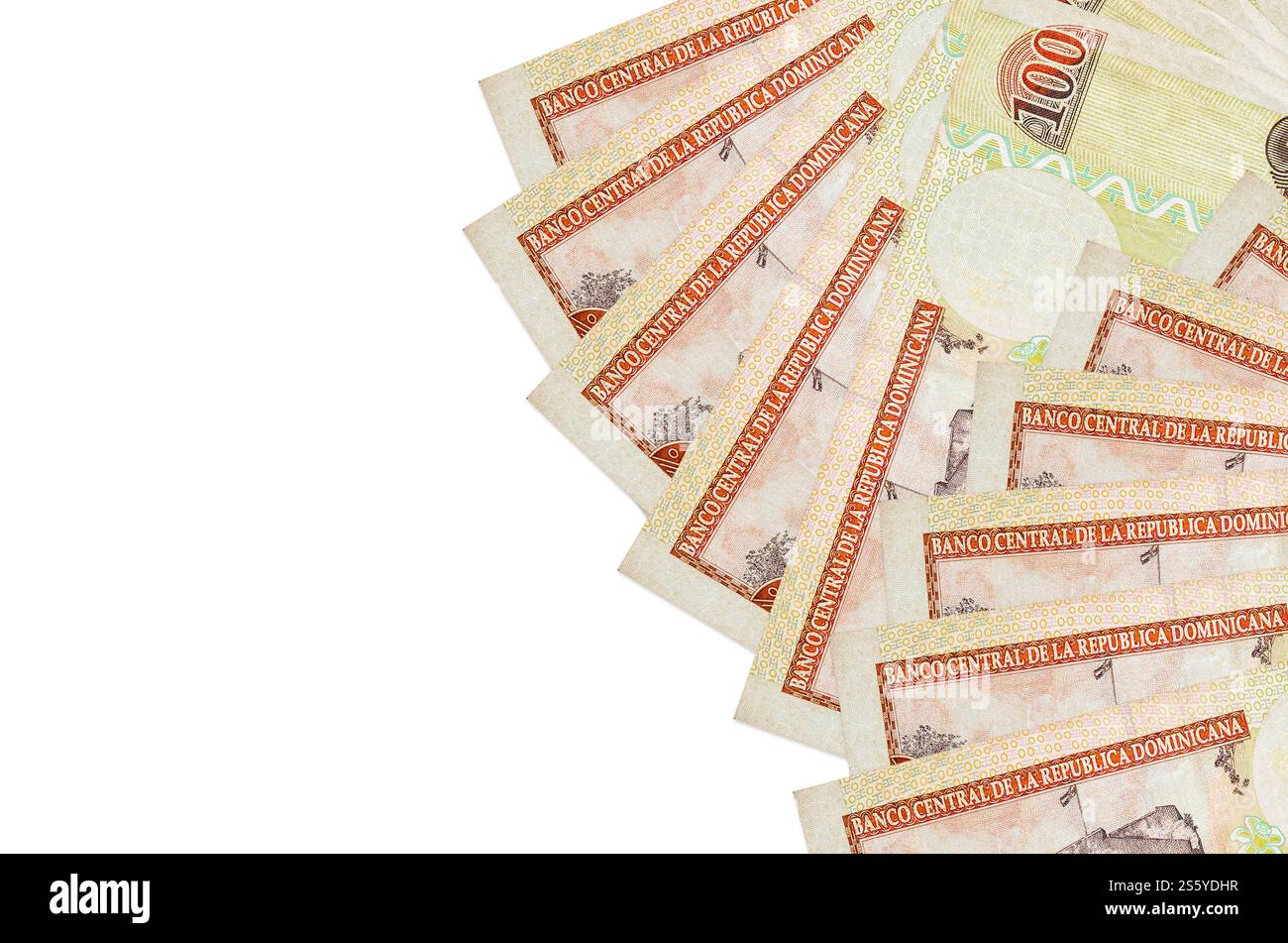 100 Dominican peso bills lies isolated on white background with copy ...