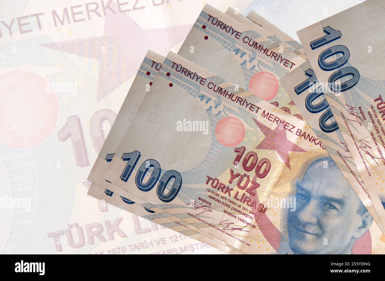 100 Turkish liras bills lies in stack on background of big semi ...