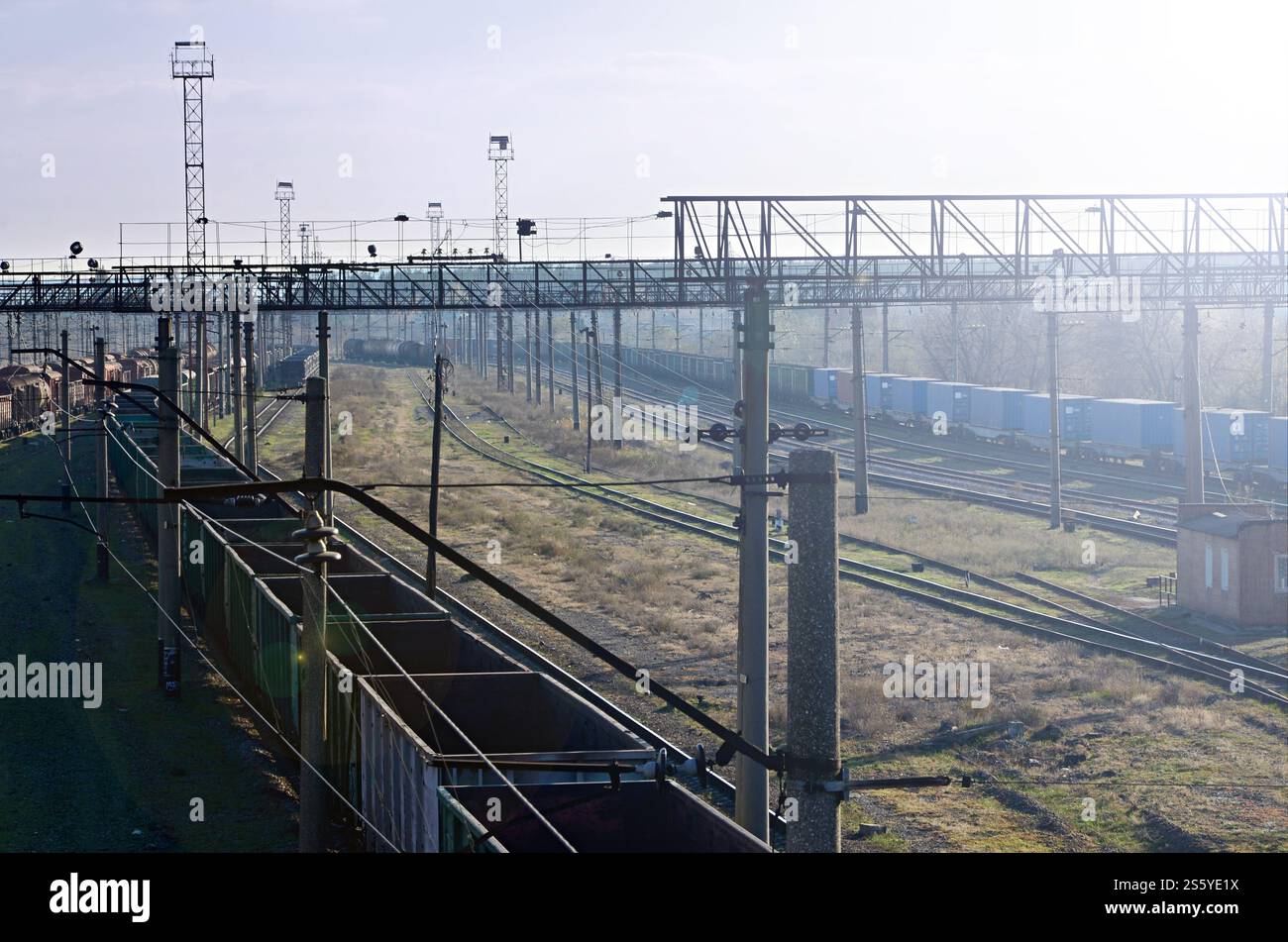 Railway landscape with many old railroad freight cars on the rails ...