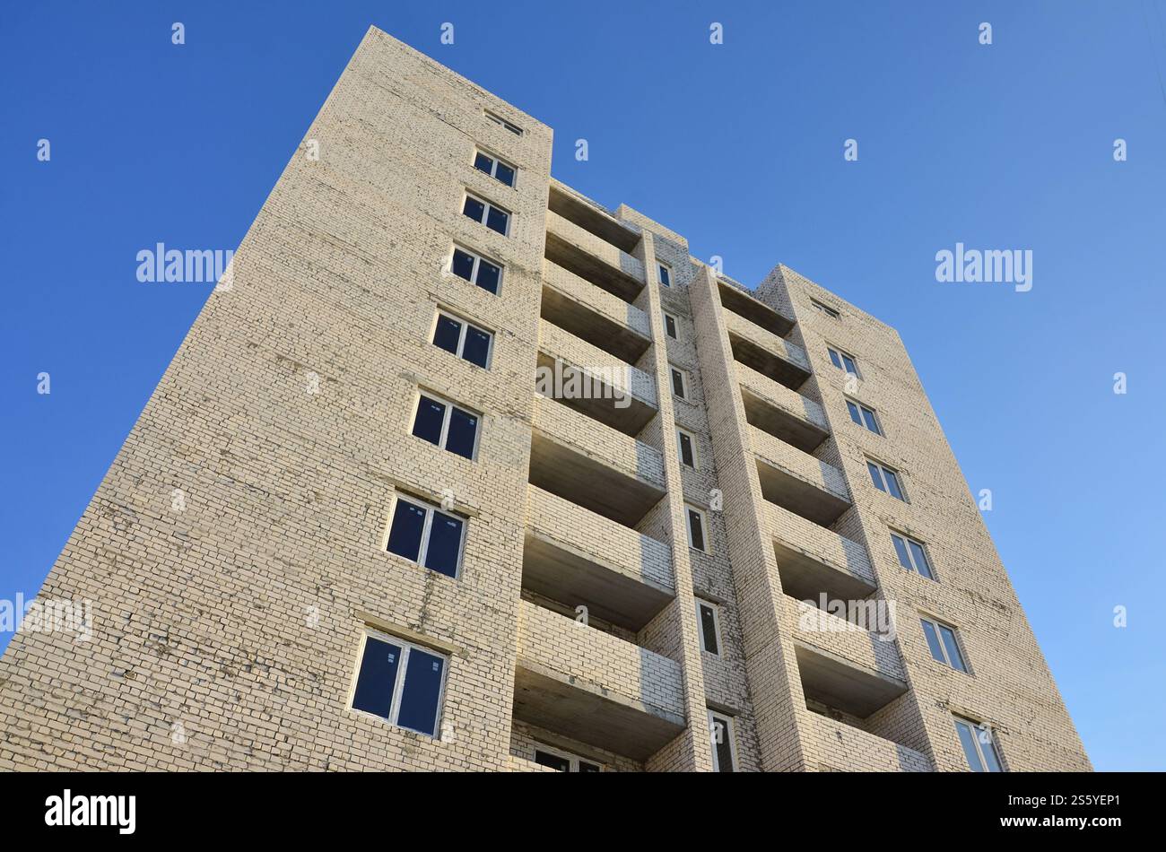 Photo of a newly built multi-storey building on a background of clear ...