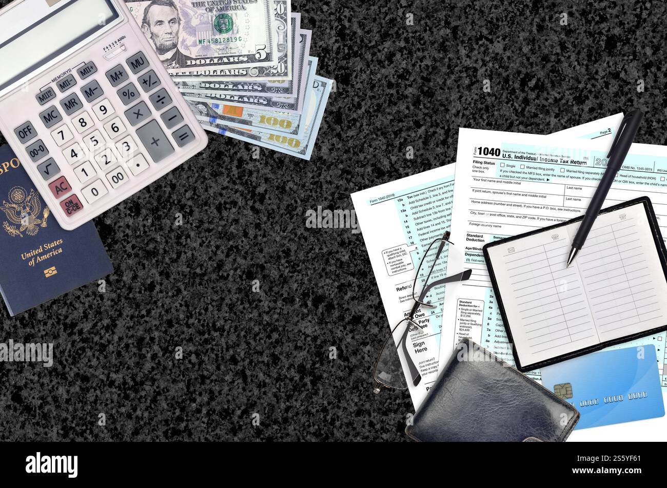 IRS form 1040 Individual income tax return lies on flat lay office ...