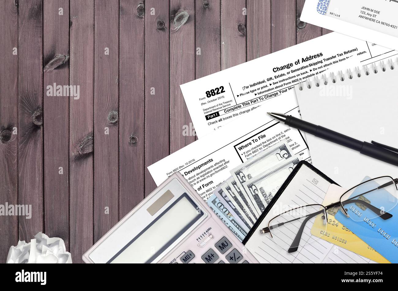 IRS form 8822 Change of Address lies on flat lay office table and ready ...