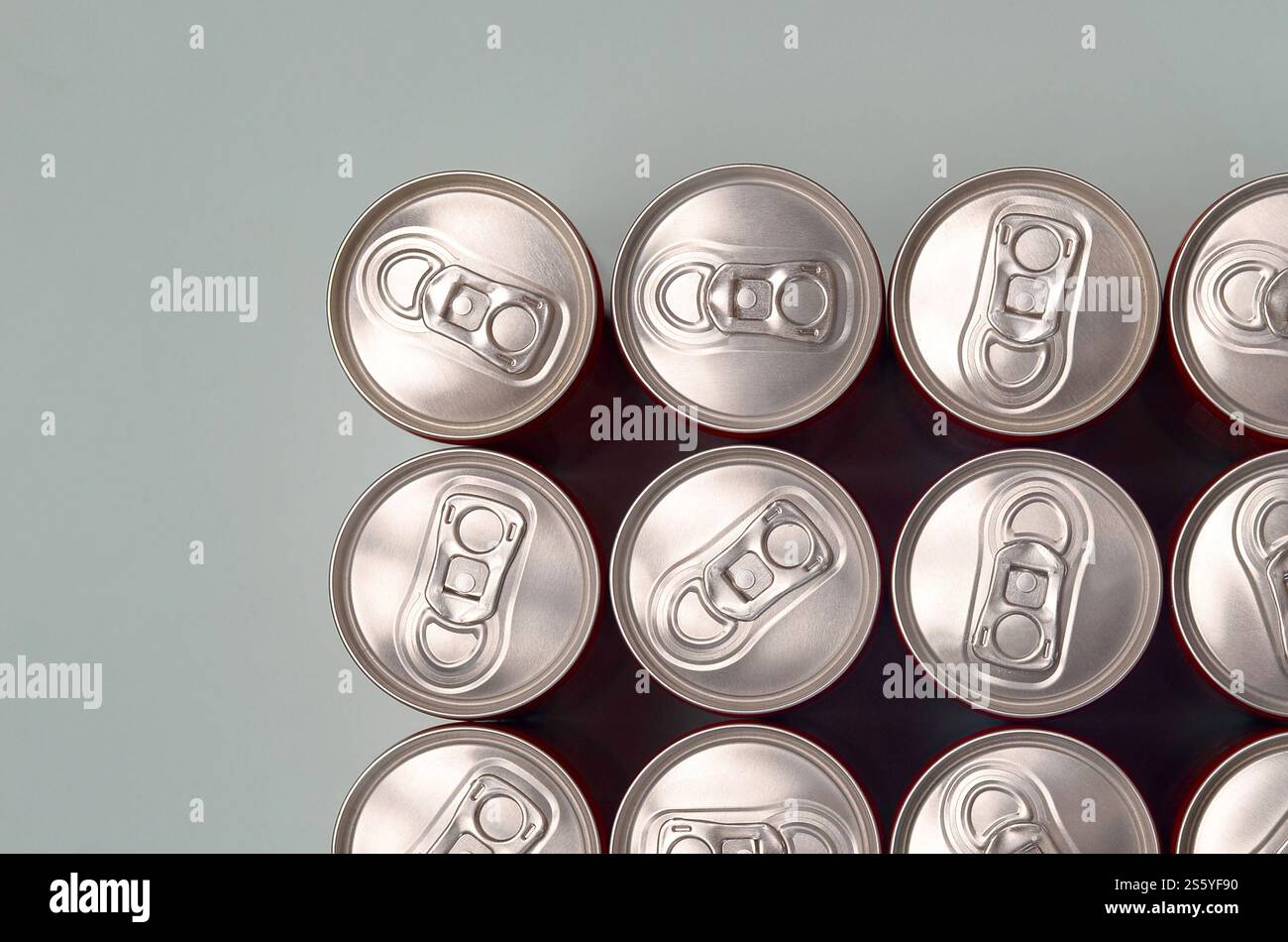 Many new aluminium cans of soda soft drink, lemonade cola, beer or ...