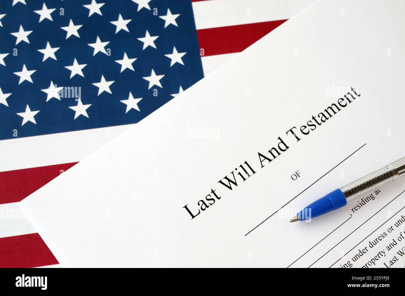 Last Will and testament blank document with pen on United States flag ...