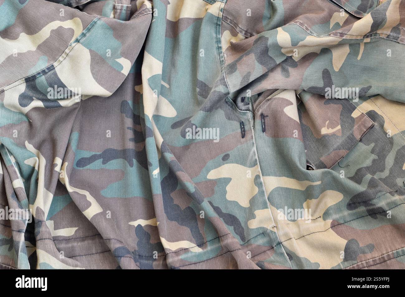 Camouflage background texture as backdrop for paintball and airsoft ...